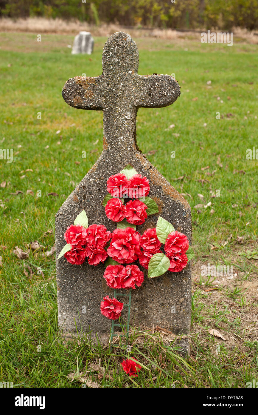 A gravestone decorated for a loved one in a New England cemetery Stock ...