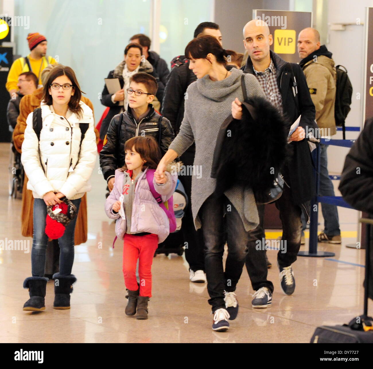 Coach Pep Guardiola and his family in the Barcelona airport to fly to ...