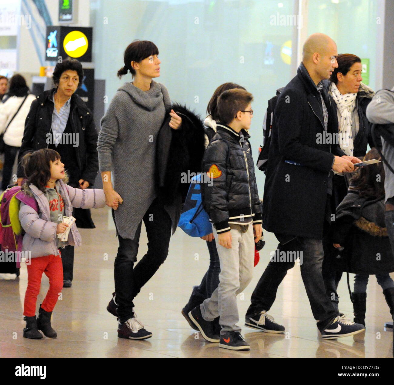 Coach Pep Guardiola and his family in the Barcelona airport to fly to ...