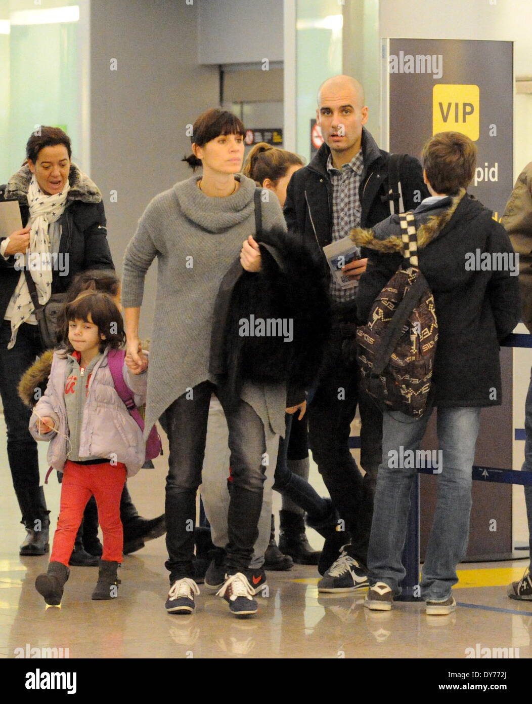 Coach Pep Guardiola and his family in the Barcelona airport to fly to ...