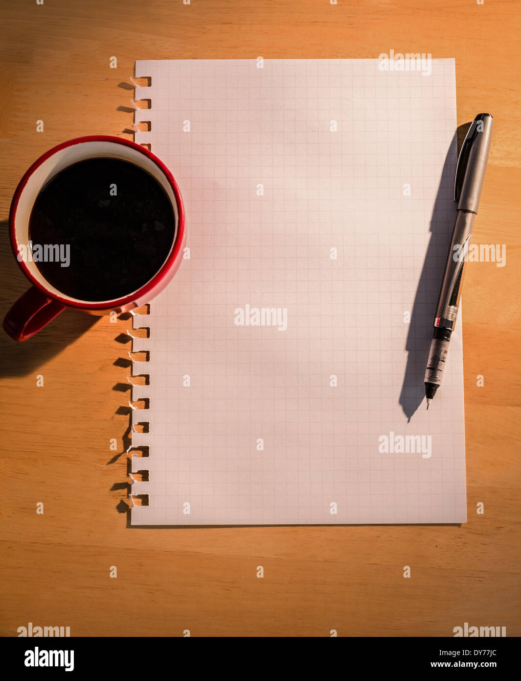 Overhead of graph paper coffee and pen Stock Photo - Alamy