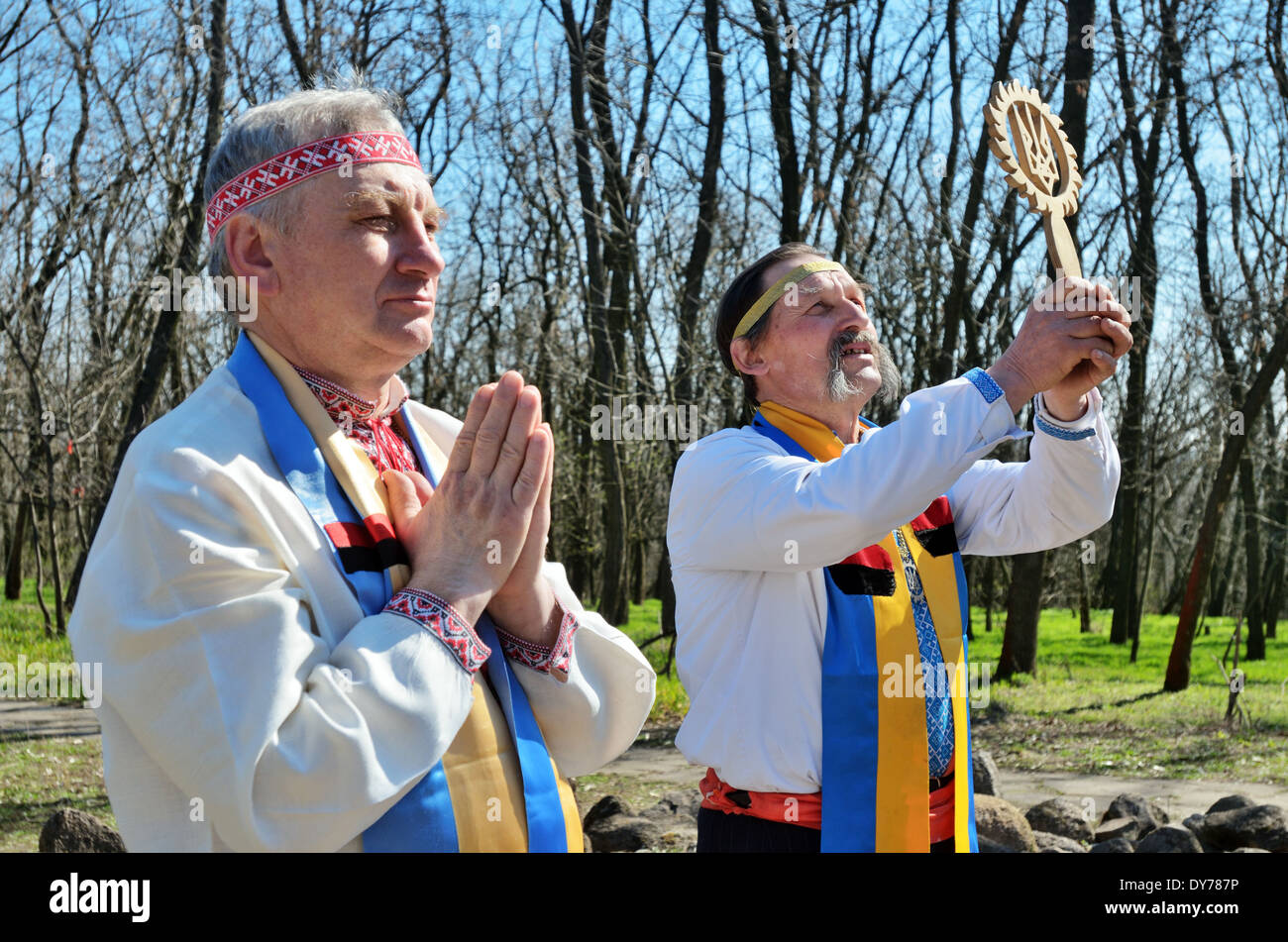 Proto-Slavic pagan rituals in Ukraine. Priests pray to the sun Stock ...