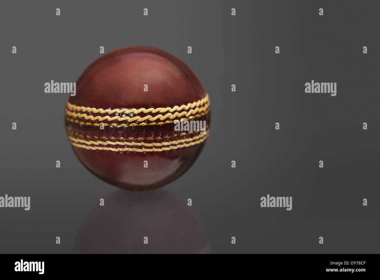 Red leather cricket ball hi-res stock photography and images - Alamy