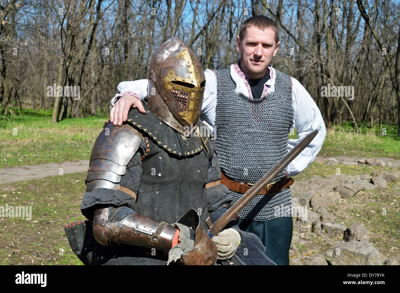 Young fellows from the club of historical fighting dressed in medieval ...