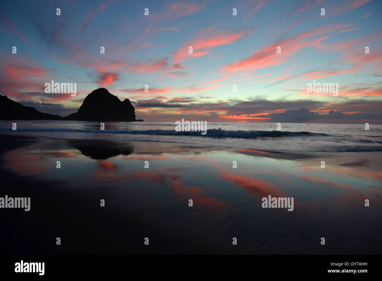 Sunset at Piha Beach, North Island, New Zealand Stock Photo - Alamy
