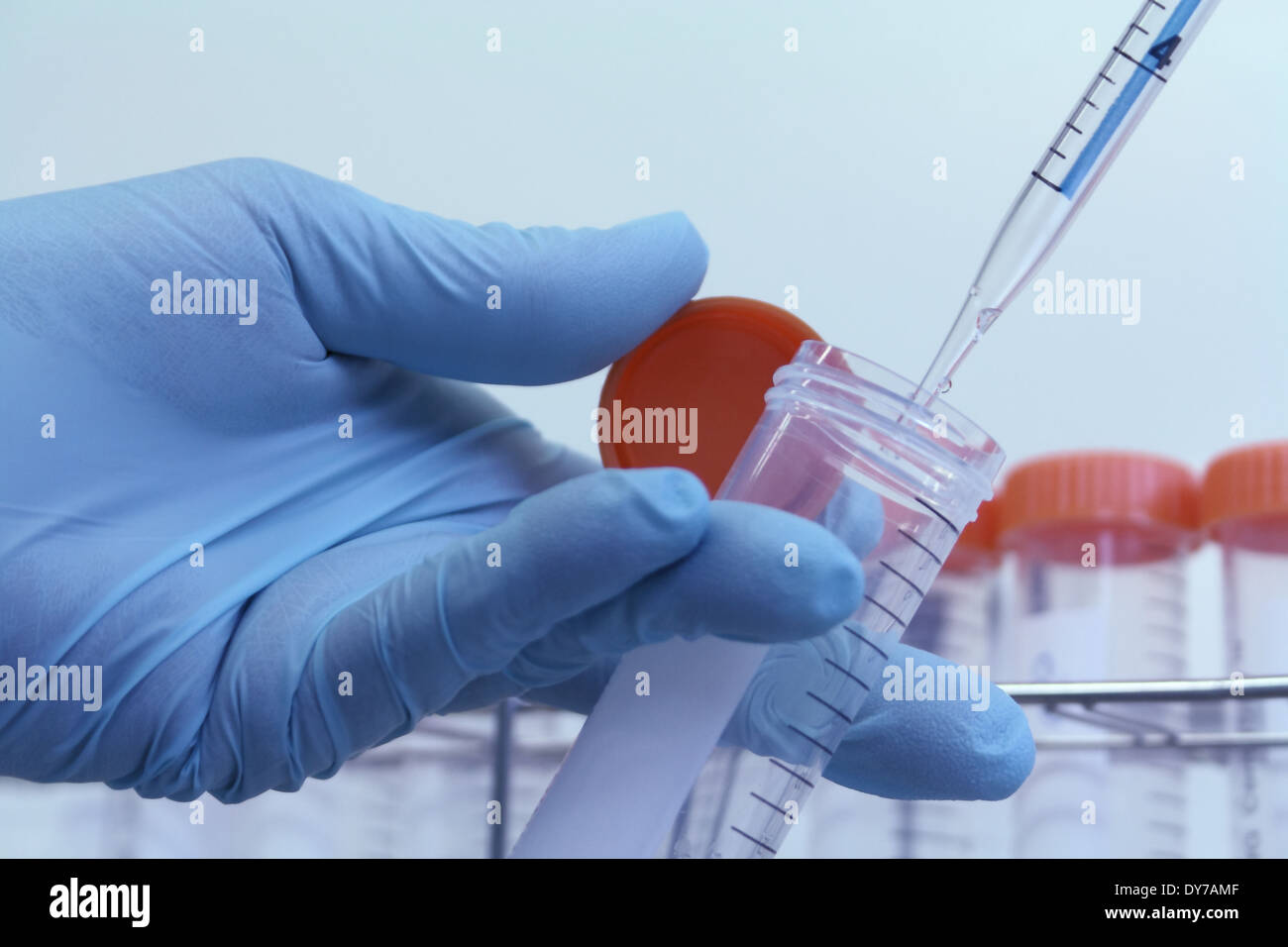 Female hand takes flask chemical hi-res stock photography and images ...