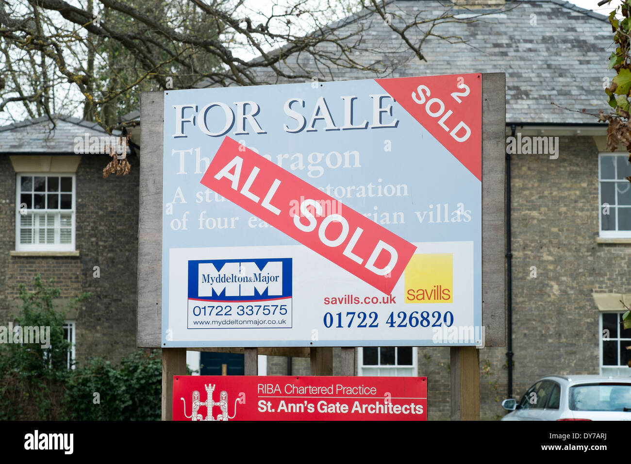 UK estate agents board showing all properties sold Stock Photo - Alamy
