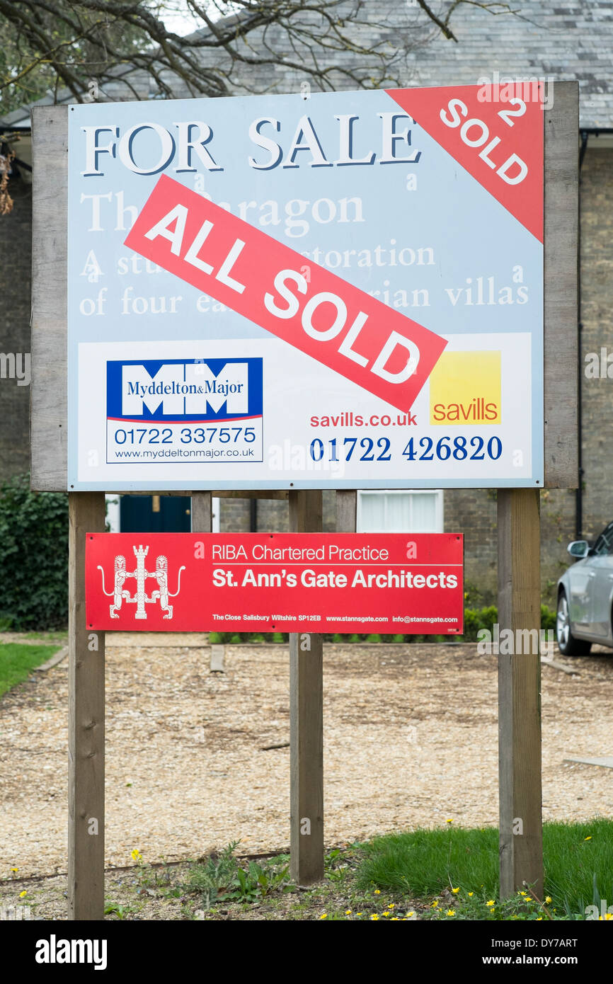 UK estate agents board showing all properties sold Stock Photo - Alamy