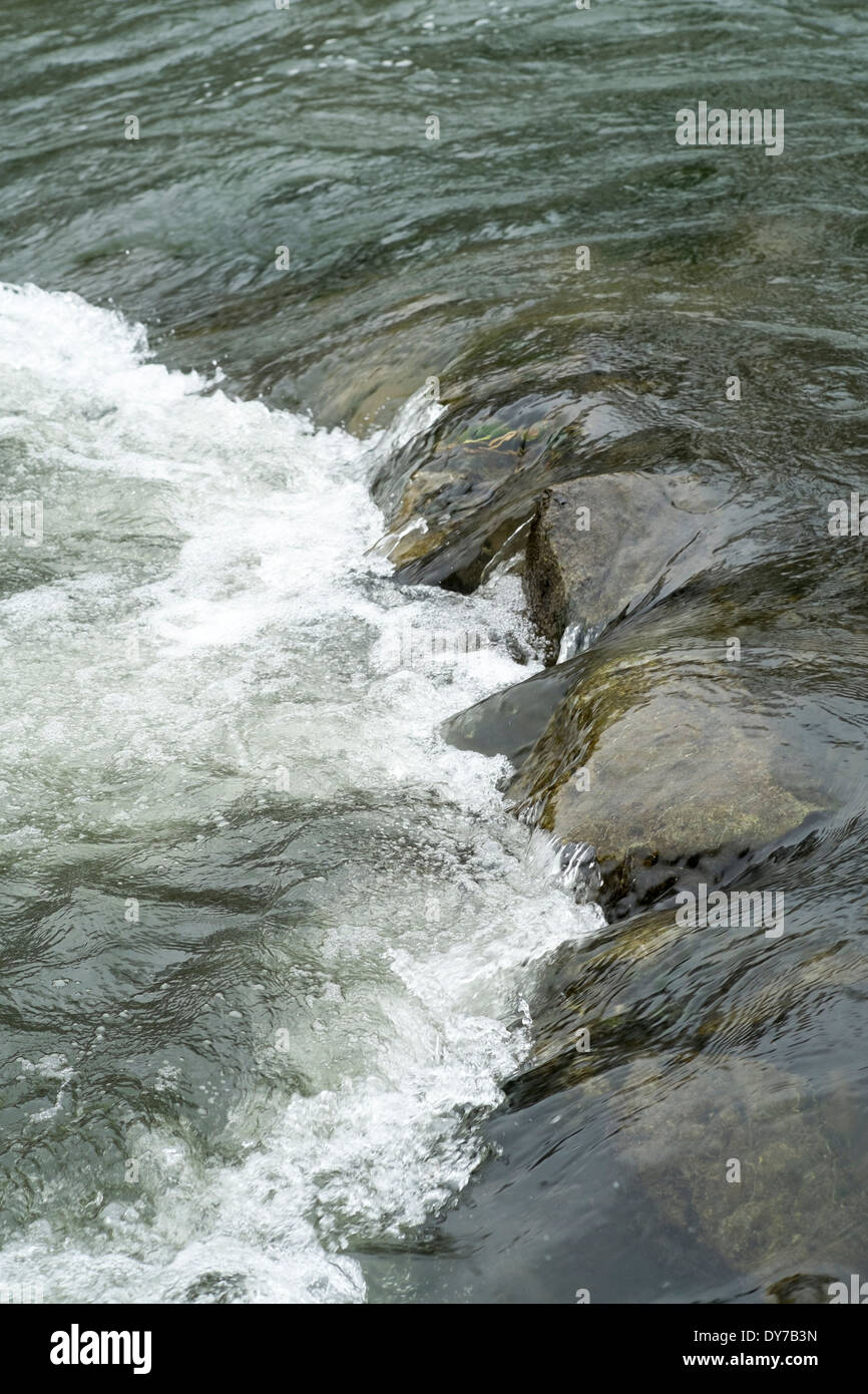 Water running over rocks Stock Photo - Alamy