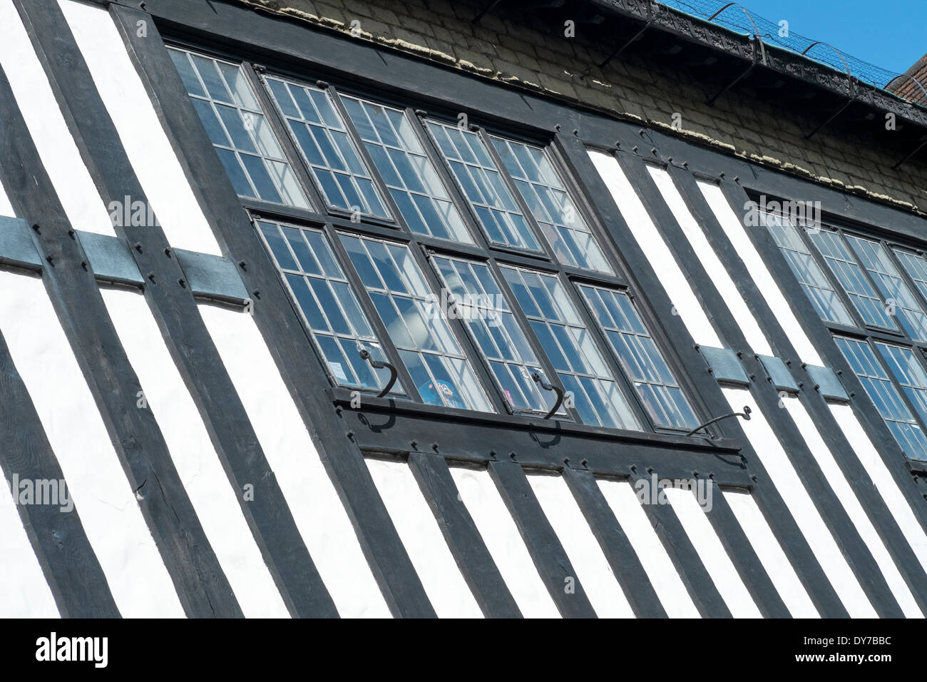 Leaded window set into timbered Tudor style building Stock Photo - Alamy