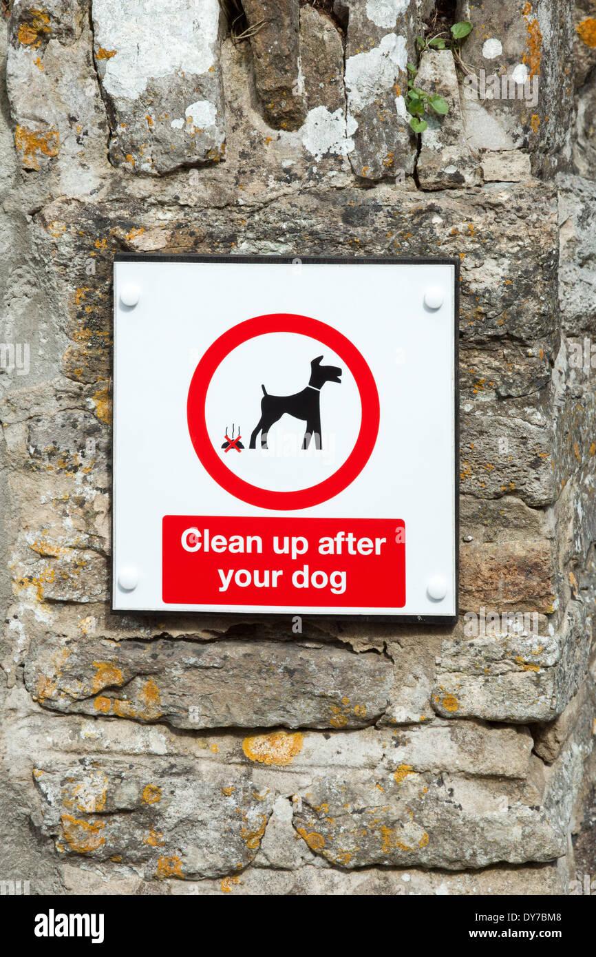 Clean up after your dog sign Stock Photo - Alamy