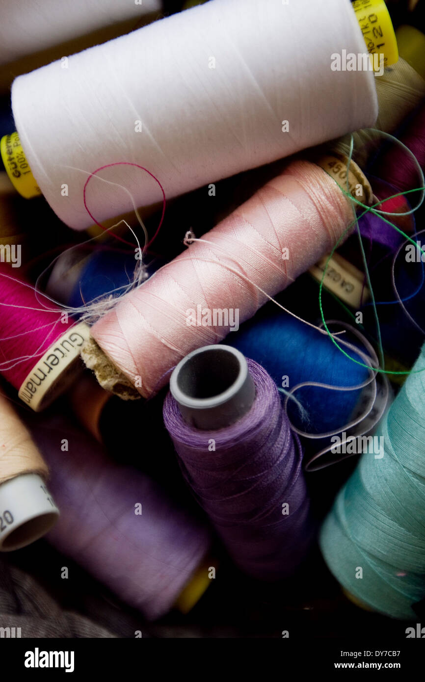 Spool of all purpose color sewing thread Stock Photo - Alamy