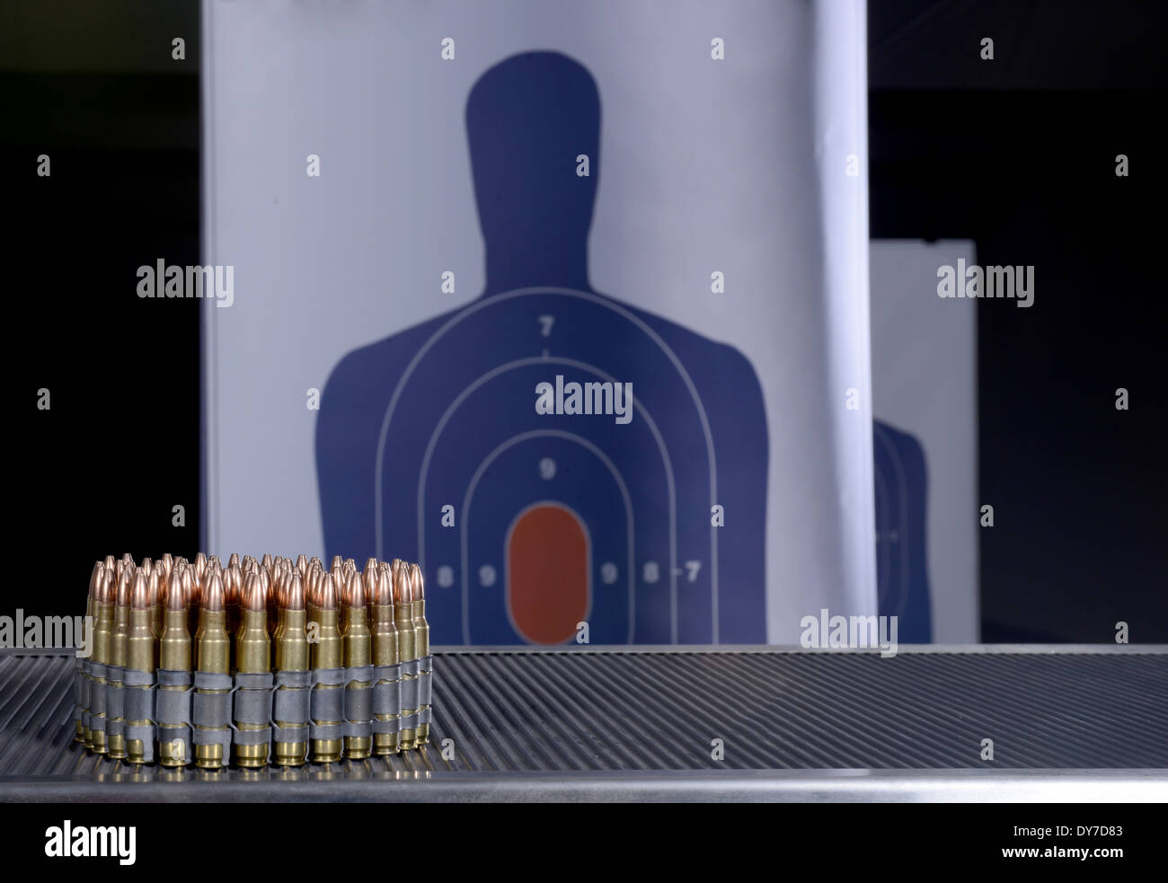 bullets and bullseye at gun range Stock Photo - Alamy