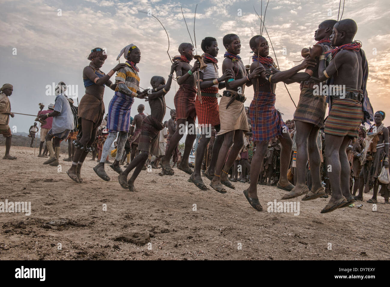 Hamer men jumping at a bull jumping ceremony near Turmi in the Omo ...
