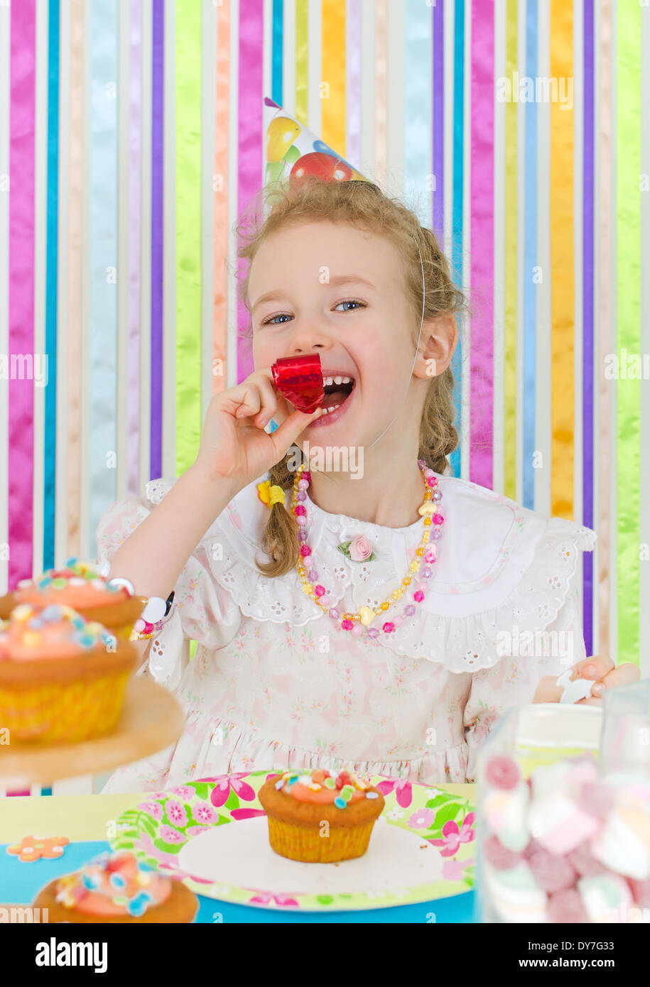 Adorable little girl celebrates her birthday Stock Photo - Alamy