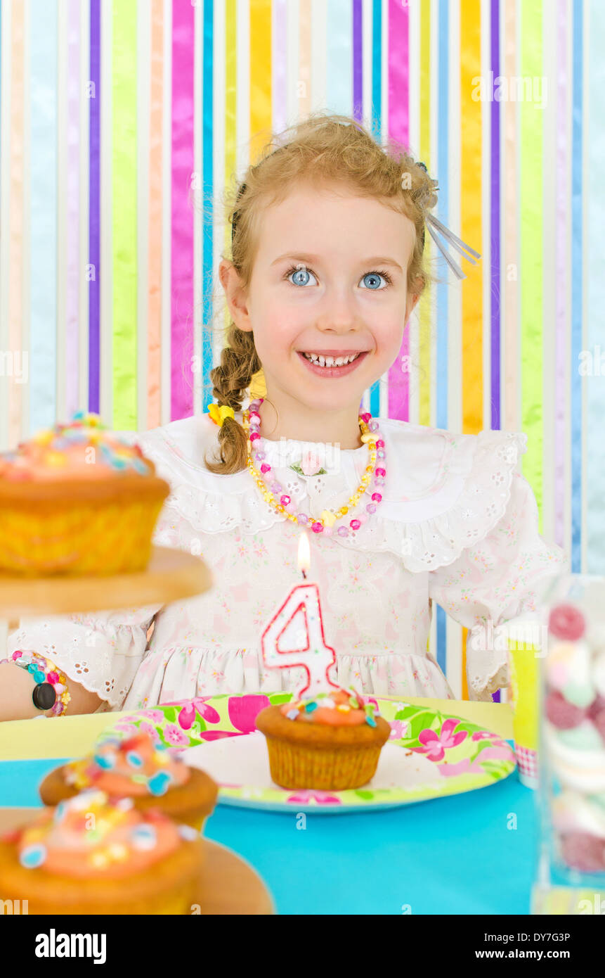 Adorable little girl celebrates her birthday Stock Photo - Alamy