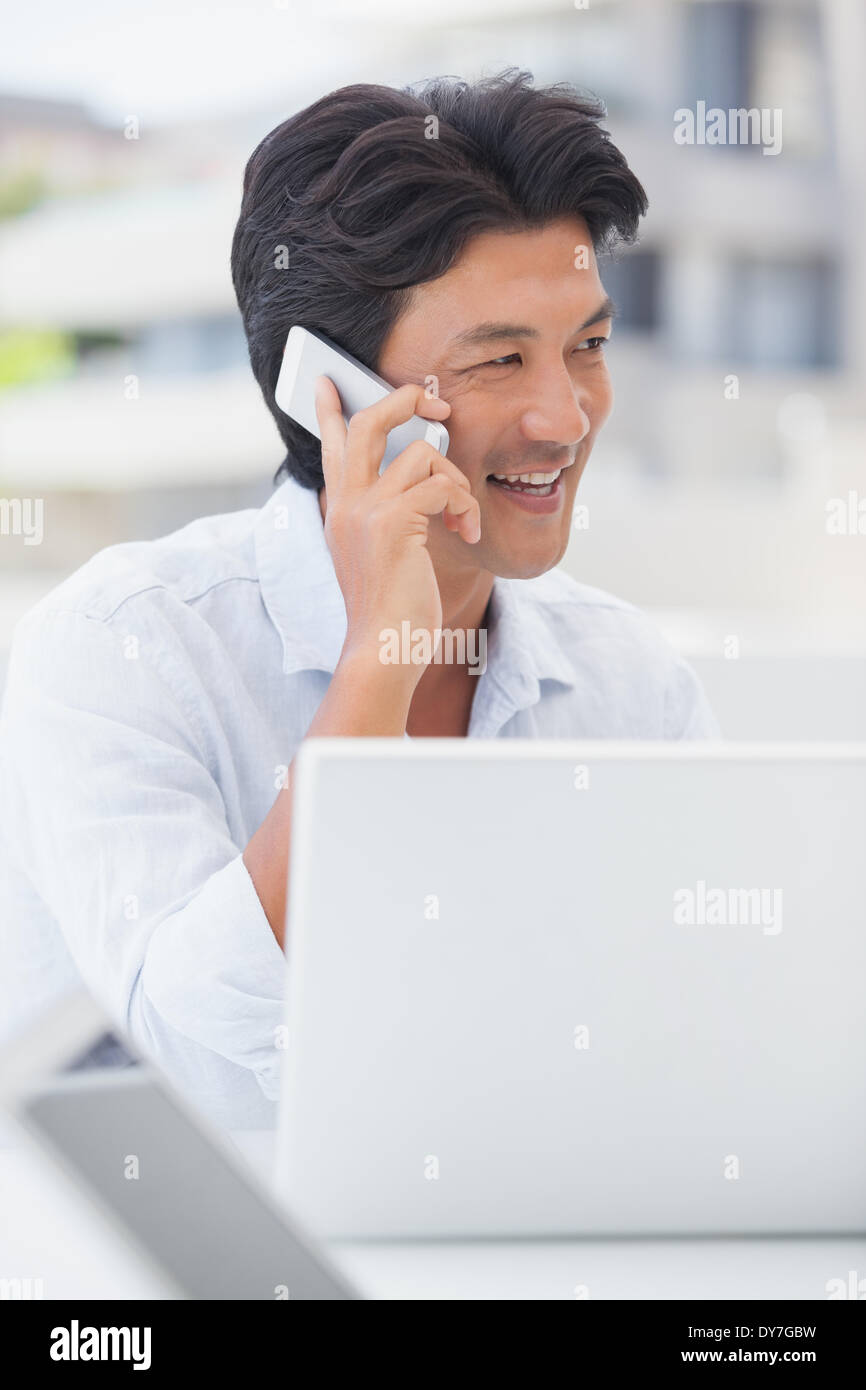 Man talking on smartphone balcony hi-res stock photography and images ...