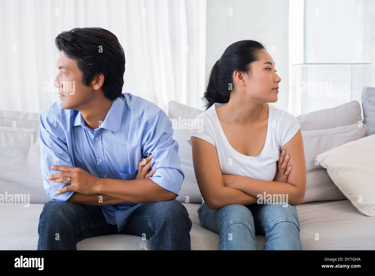 Unhappy couple not talking after an argument in bed at home Stock Photo ...