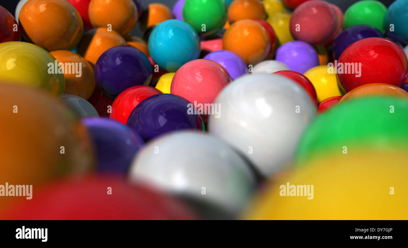 An extreme closeup of a group of gumballs with a shallow depth of field ...