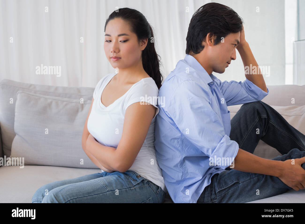Unhappy couple not talking after an argument in bed at home Stock Photo ...