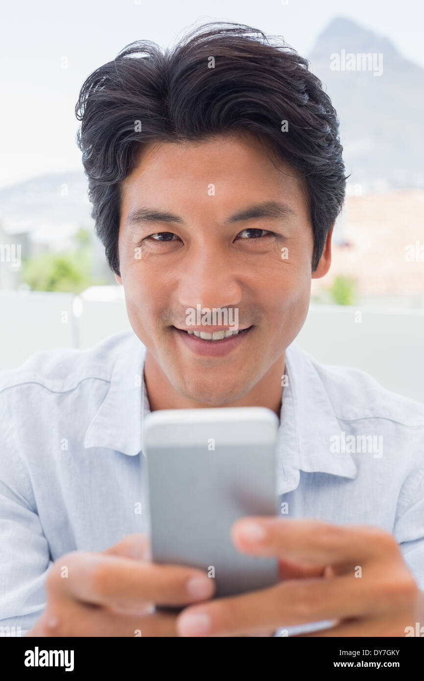 Man sending text message hi-res stock photography and images - Alamy