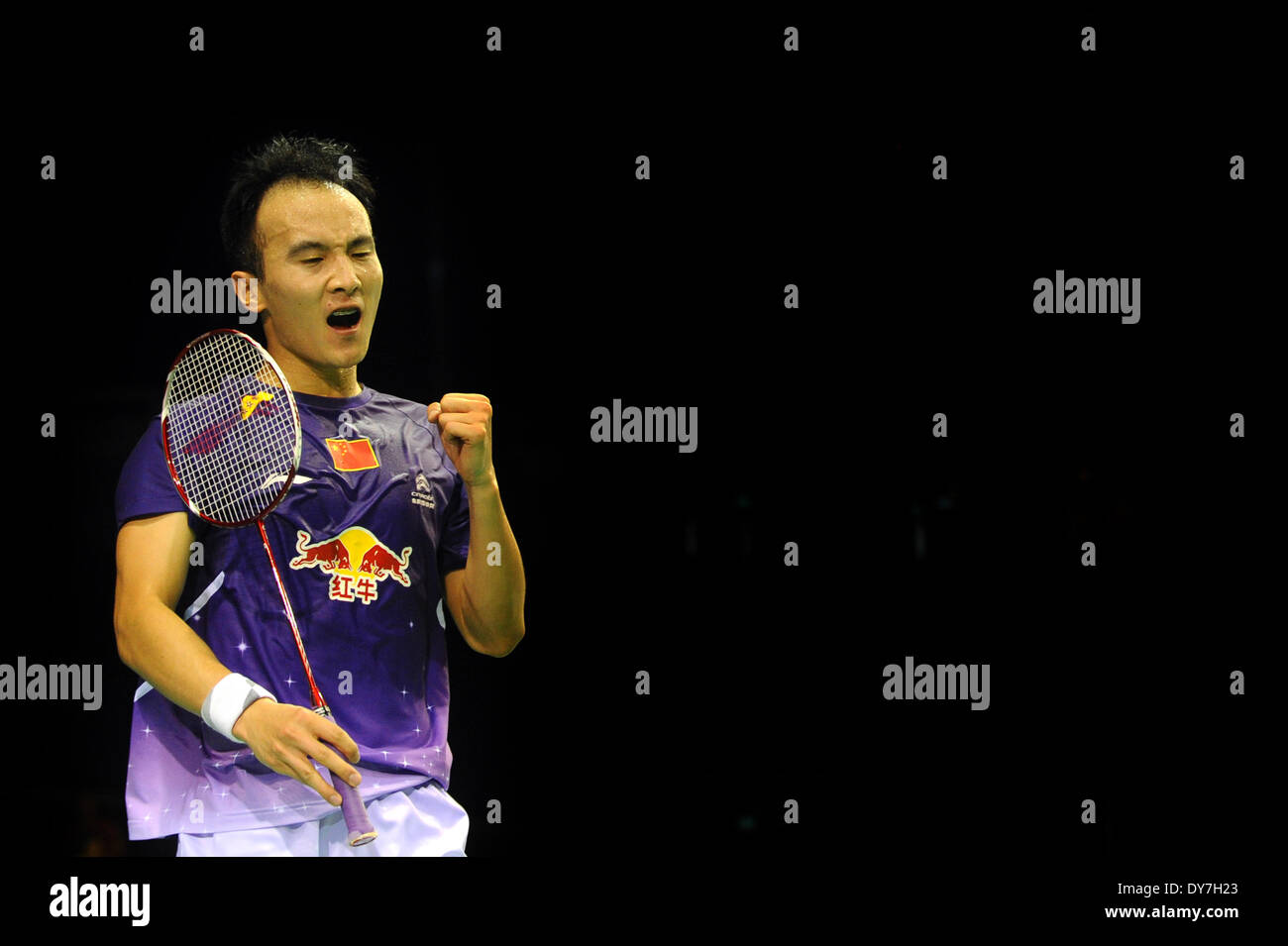 Singapore. 9th Apr, 2014. Du Pengyu of China celebrates a score during ...