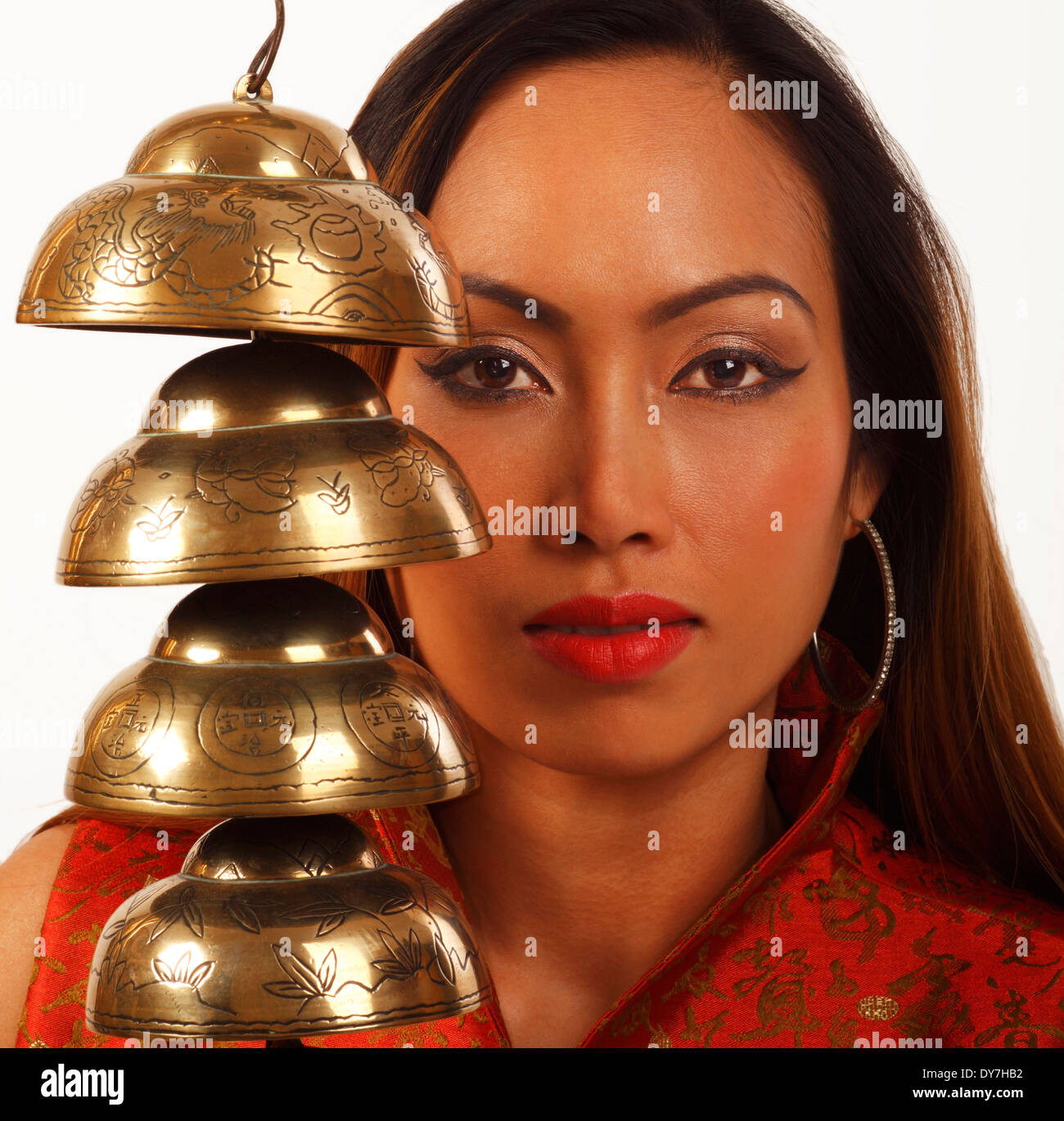 Oriental woman with a Chinese bell tree Stock Photo - Alamy
