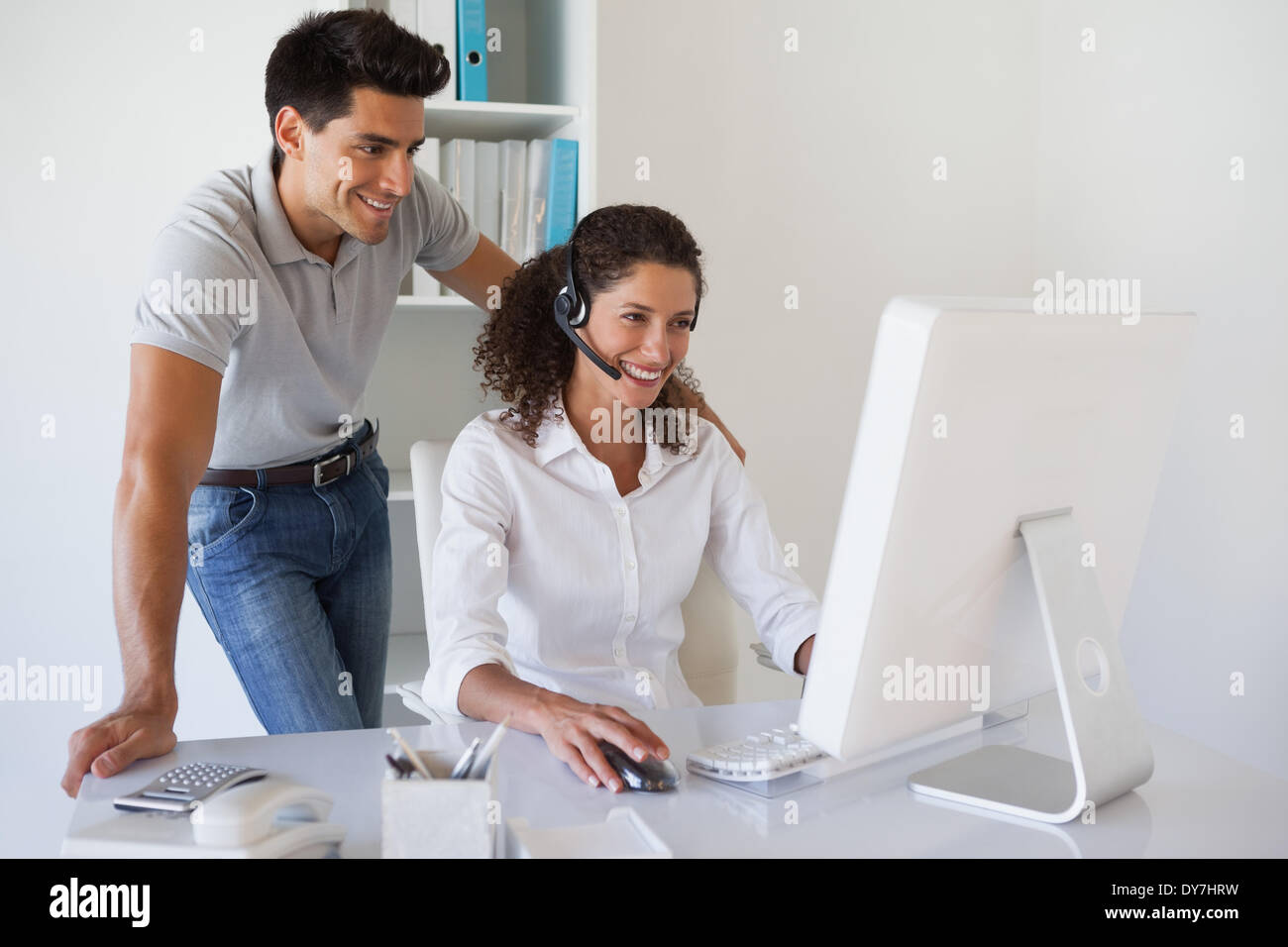 Businessman woman looking computer hi-res stock photography and images ...