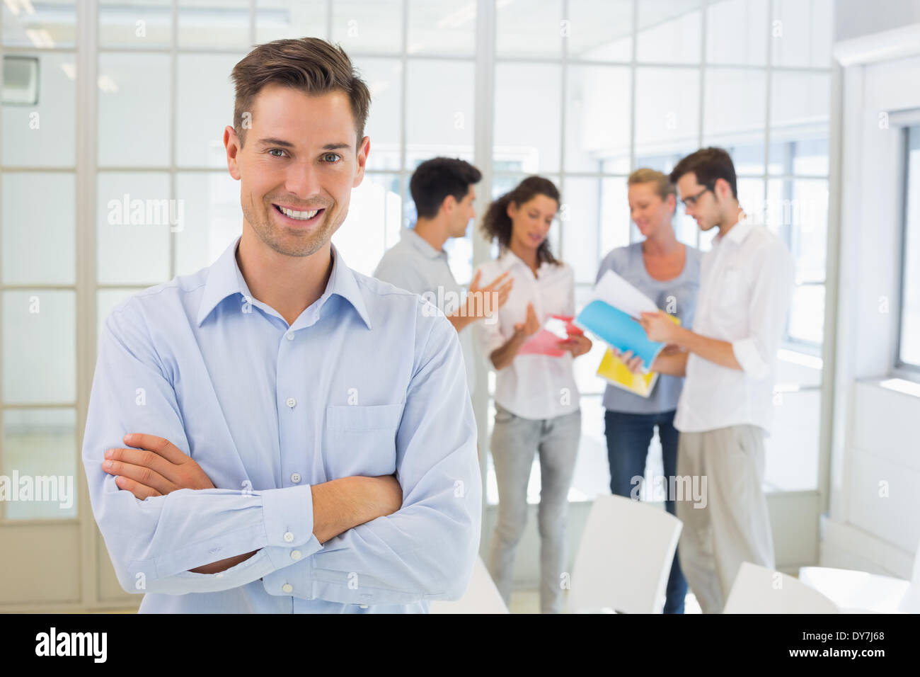 Male boss smiling at woman hi-res stock photography and images - Alamy