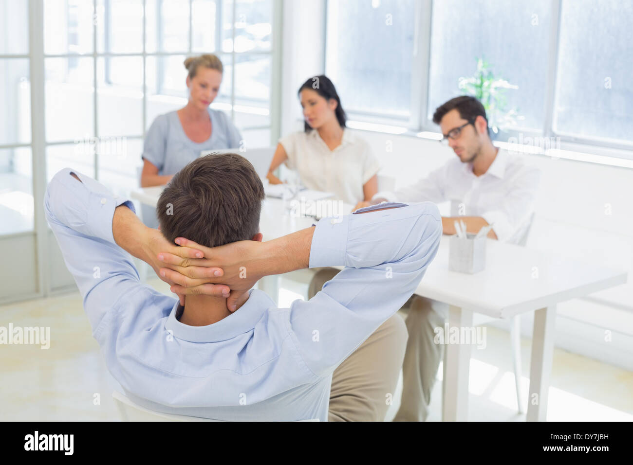 Businessman leaning back hi-res stock photography and images - Alamy