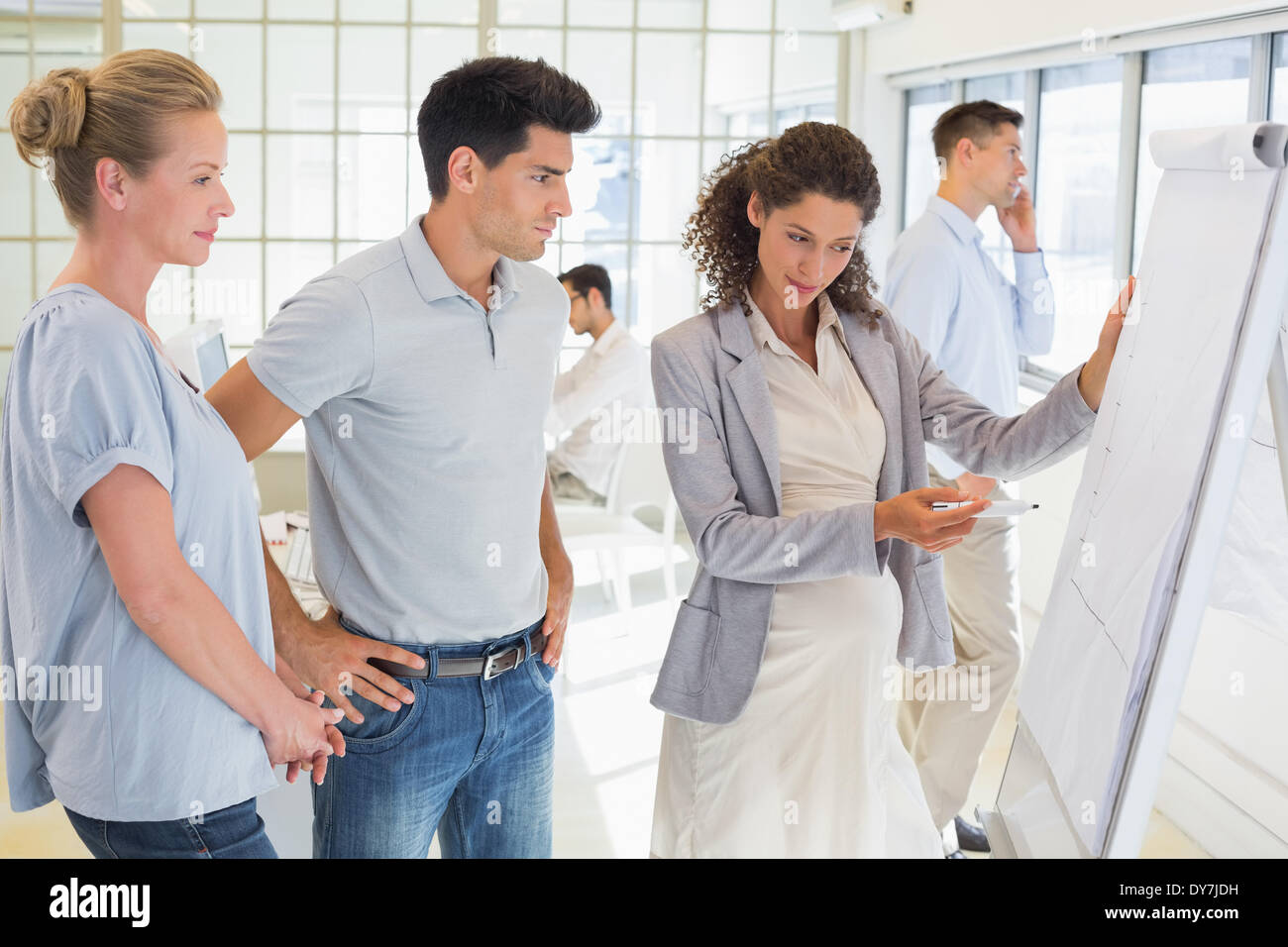 Mature businesswoman presenting ideas hi-res stock photography and ...