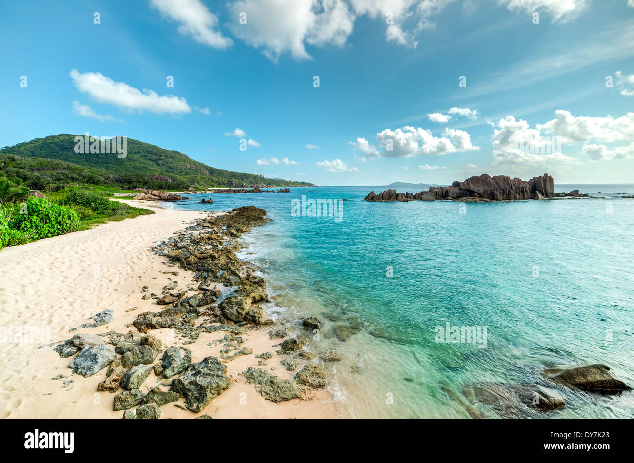 tropical turquoise sea with granite boulders Stock Photo - Alamy
