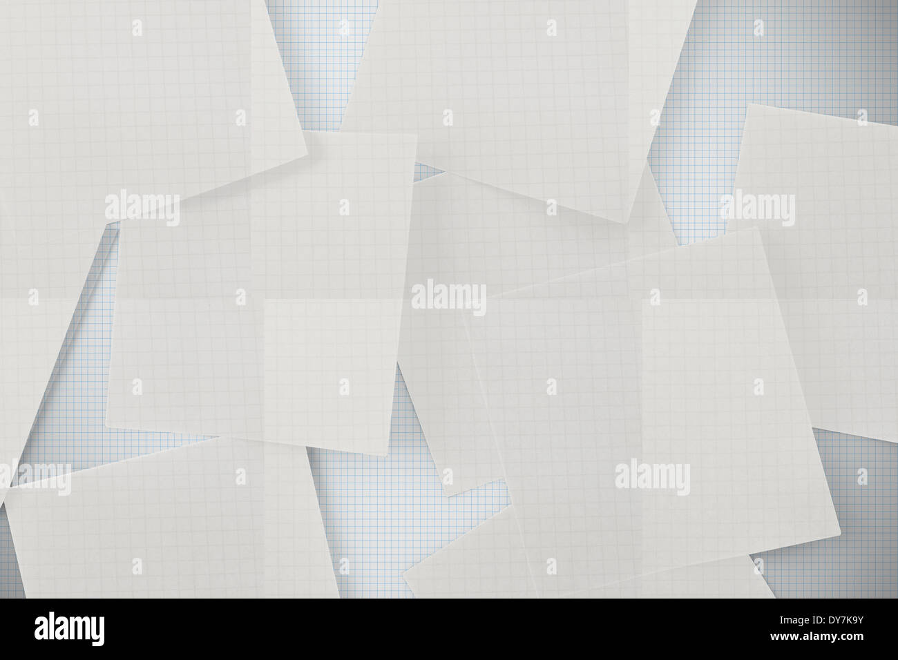 White paper strewn over grid Stock Photo - Alamy