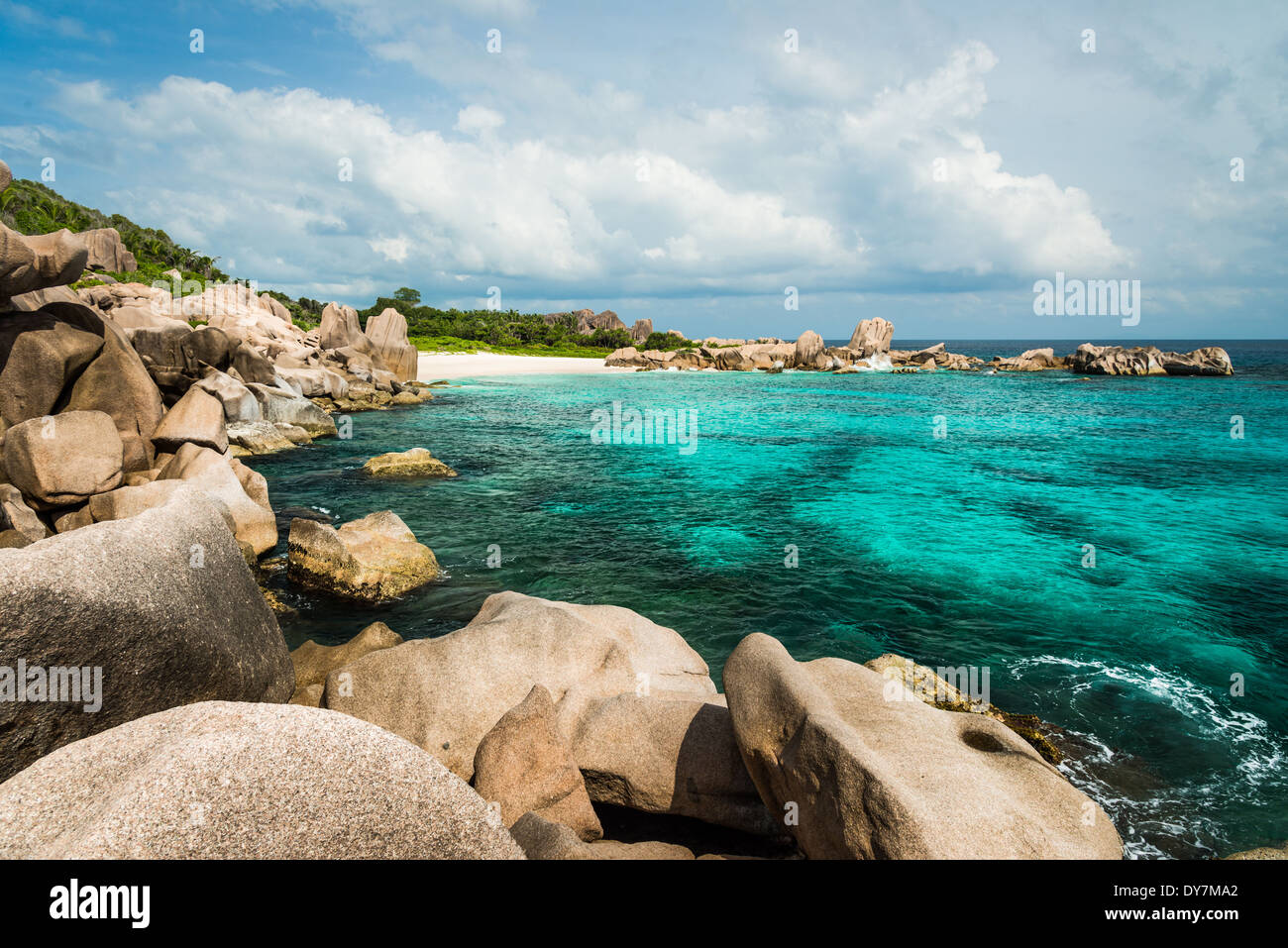 tropical turquoise sea with granite boulders Stock Photo - Alamy