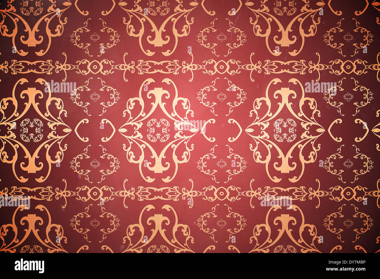 Elegant patterned wallpaper in red and gold Stock Photo - Alamy