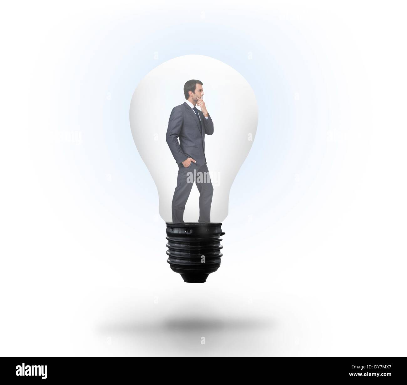 Thinking businessman in light bulb against giant padlock with circuit ...