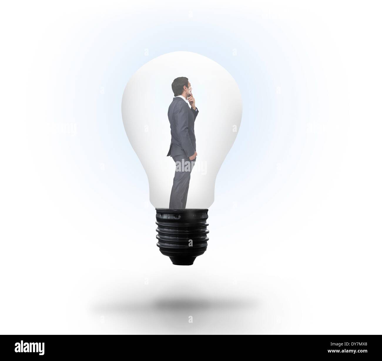 Thinking businessman in light bulb on white background Stock Photo - Alamy