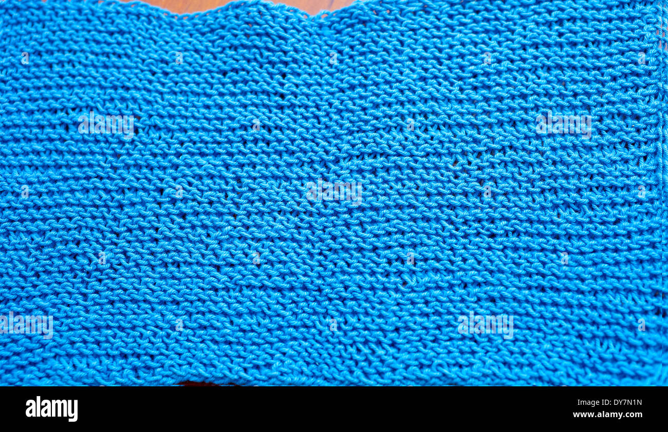 Blue knitting background Stock Photo - Alamy