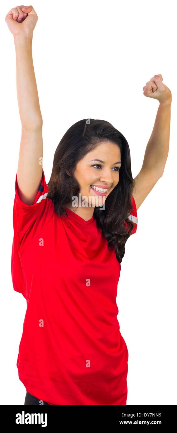 Cheering football fan in red on white background Stock Photo - Alamy