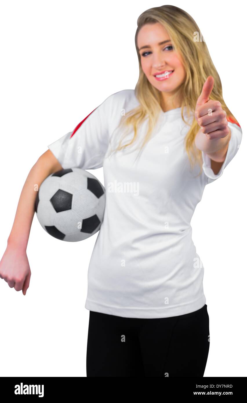 Pretty football fan in white smiling Stock Photo - Alamy