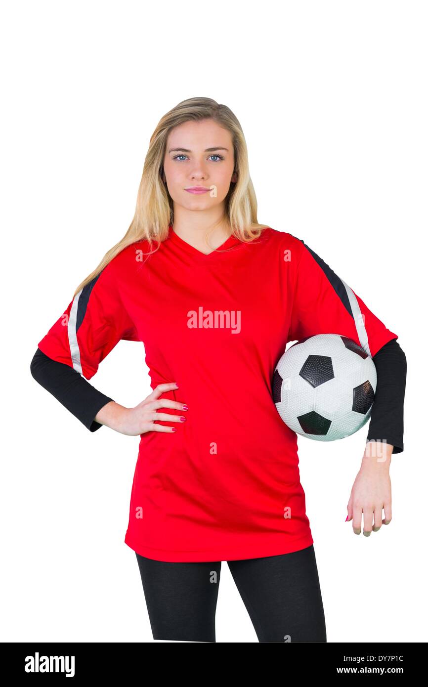 Pretty football fan in red on white background Stock Photo - Alamy