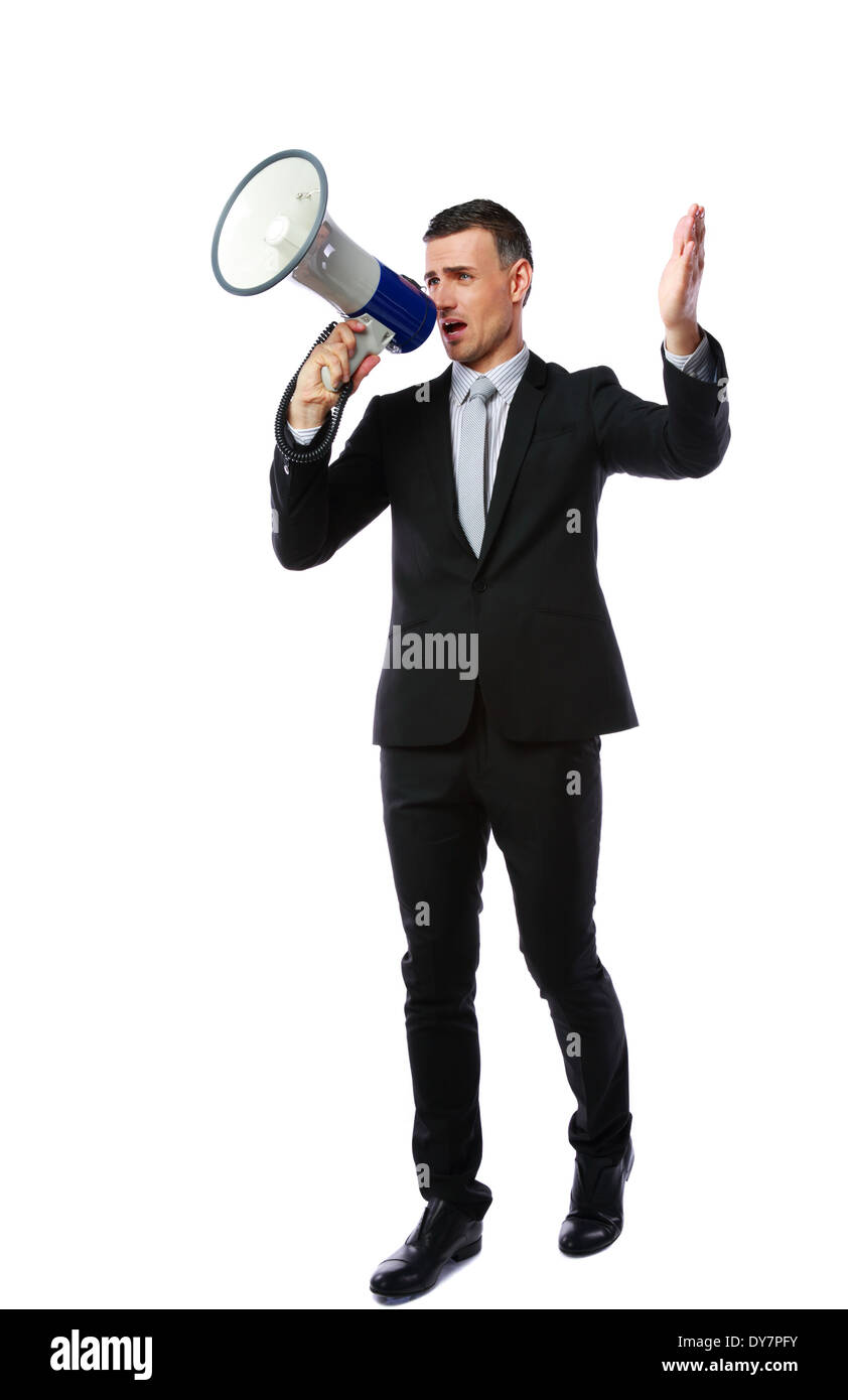 Full length portrait of businessman yelling through megaphone isolated ...