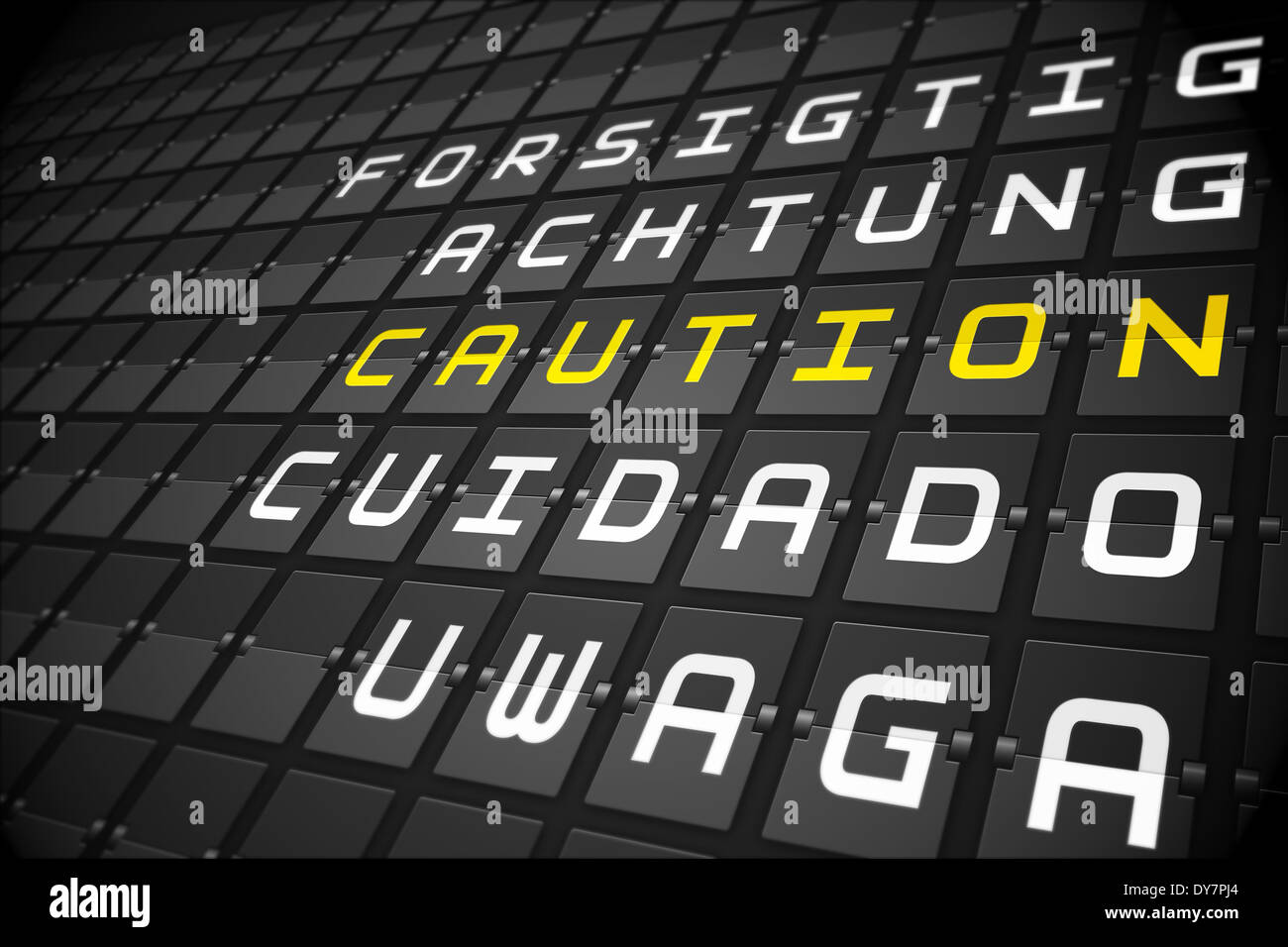 Caution in languages on black mechanical board Stock Photo - Alamy