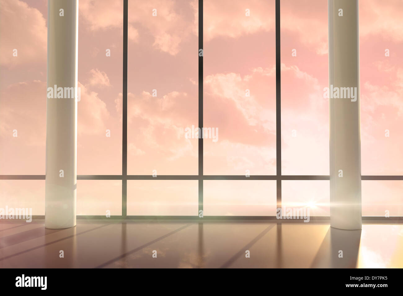 Room with large windows showing sunrise Stock Photo - Alamy