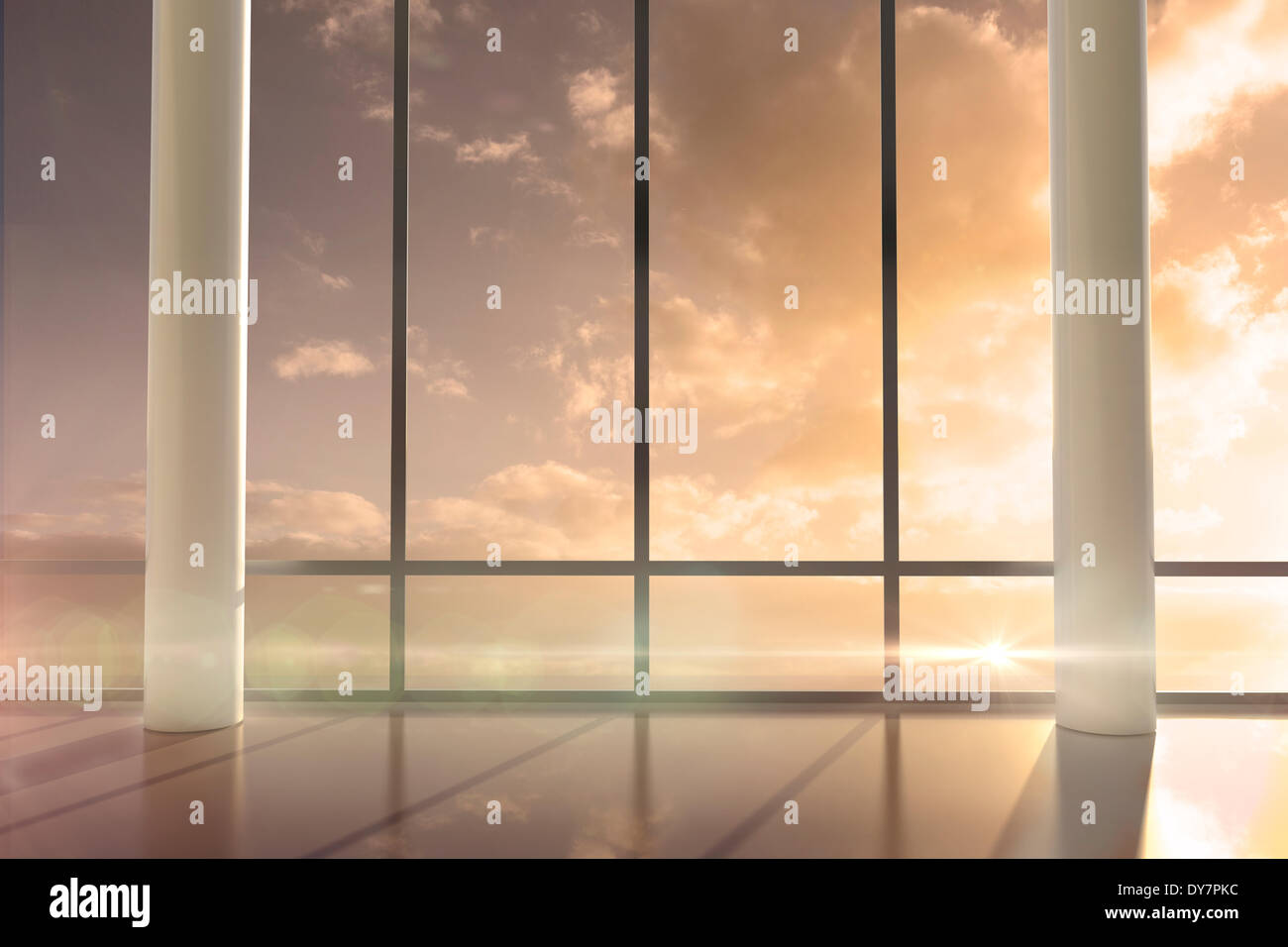 Room with large windows showing sunrise Stock Photo - Alamy