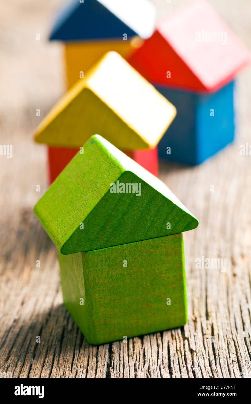 Green house made from wooden cubes on wooden background Stock Photo - Alamy