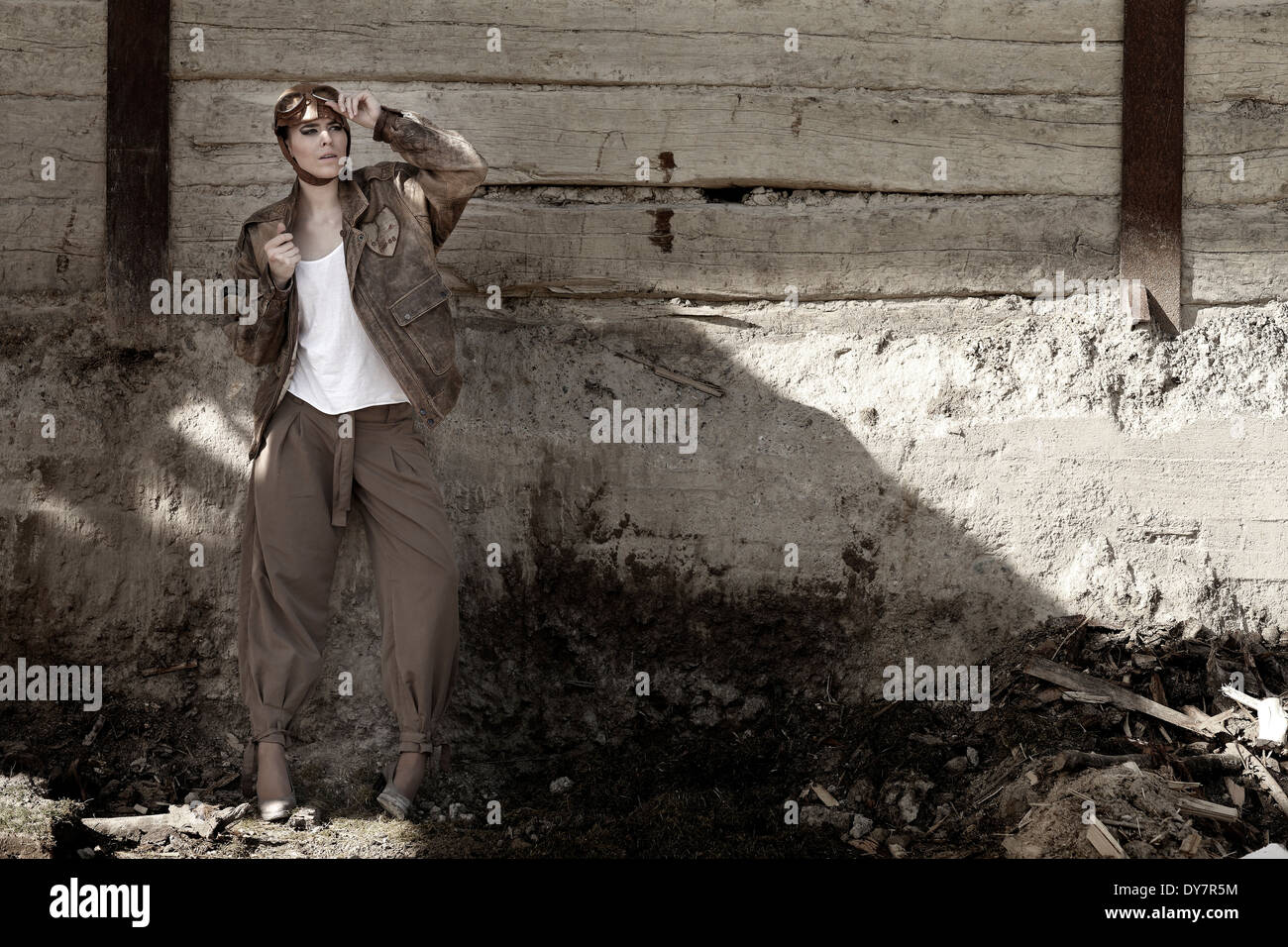 Young woman wearing pilot work cloth Stock Photo - Alamy