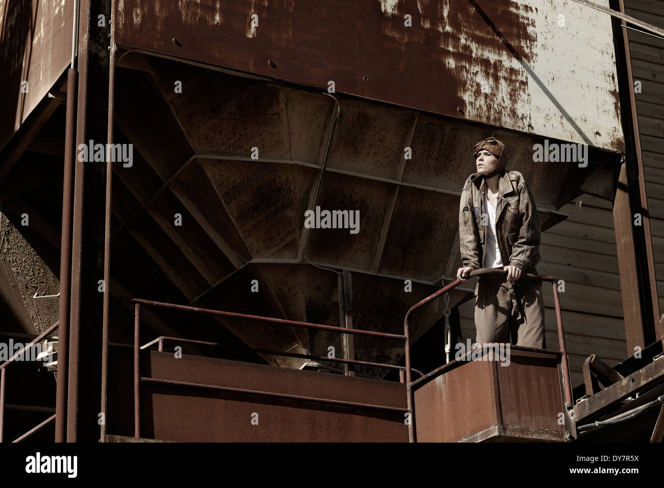 Young woman wearing pilot work cloth Stock Photo - Alamy