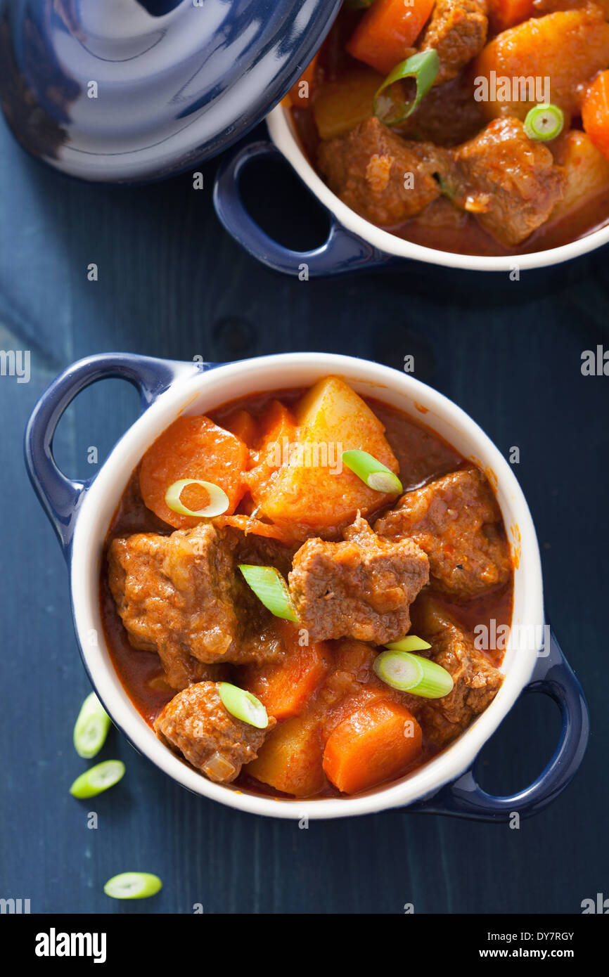 beef stew with potato and carrot in blue pots Stock Photo - Alamy