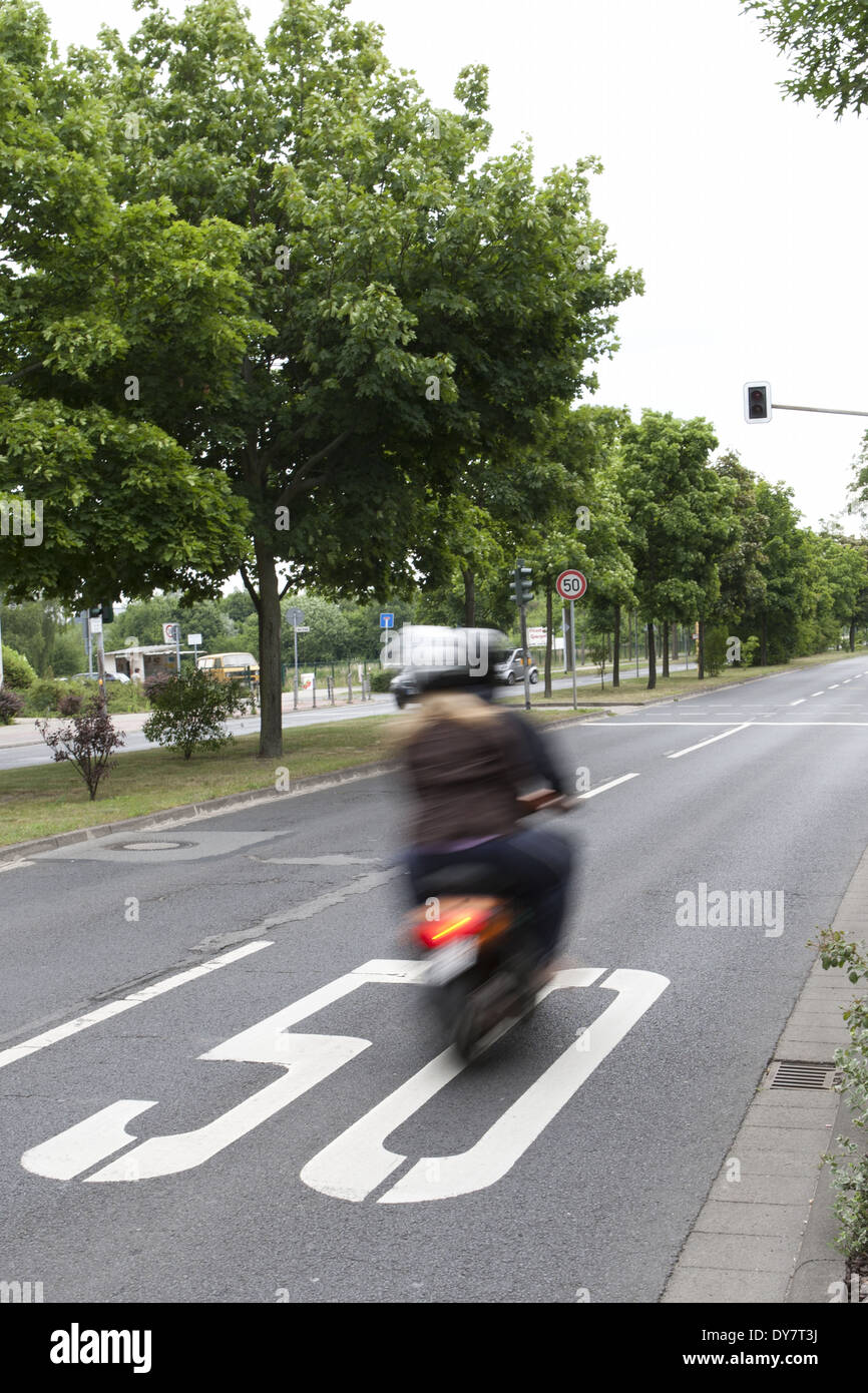 Person riding moped hi-res stock photography and images - Alamy